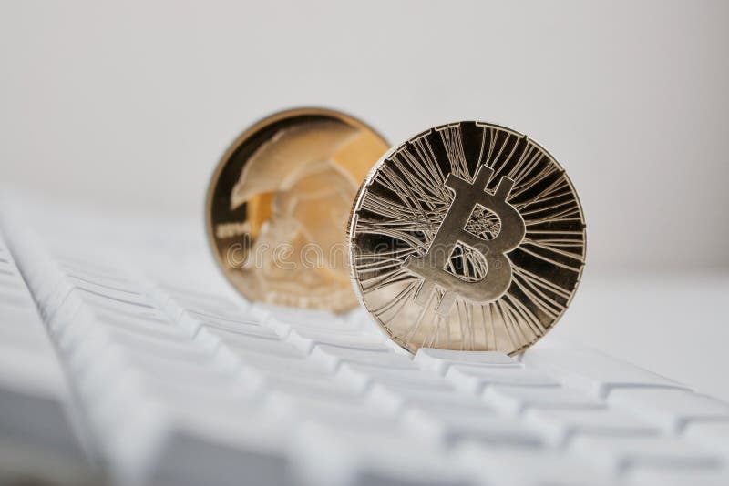 Two bitcoins on keyboard stock image. Image of finance - 95036203