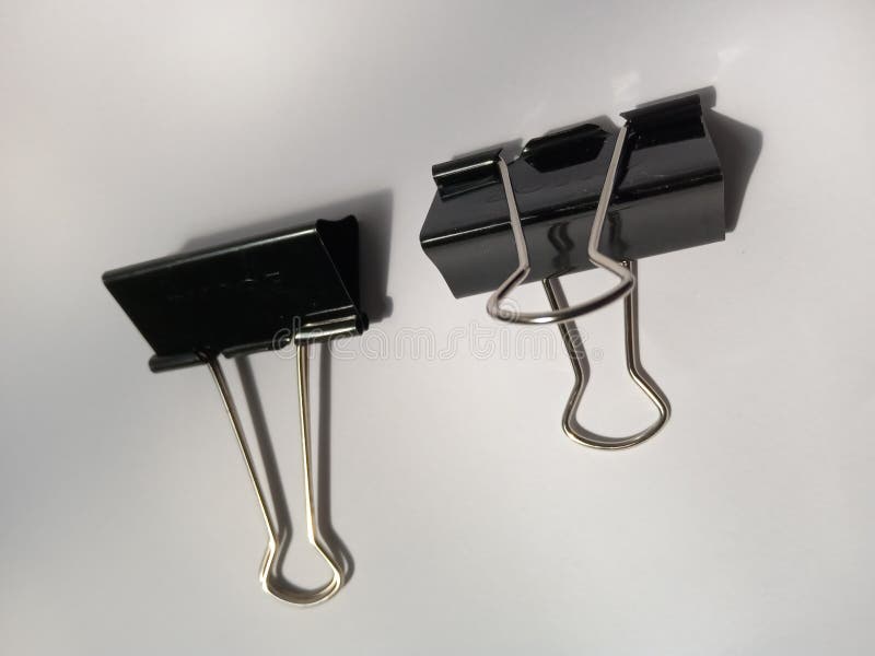 Two Black Paper Clips, Plain White Background for Design Stock Photo ...