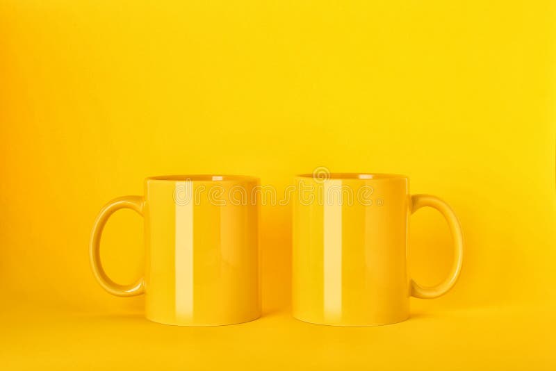 Two Blank Ceramic Mugs on Yellow Background Stock Image - Image of ...