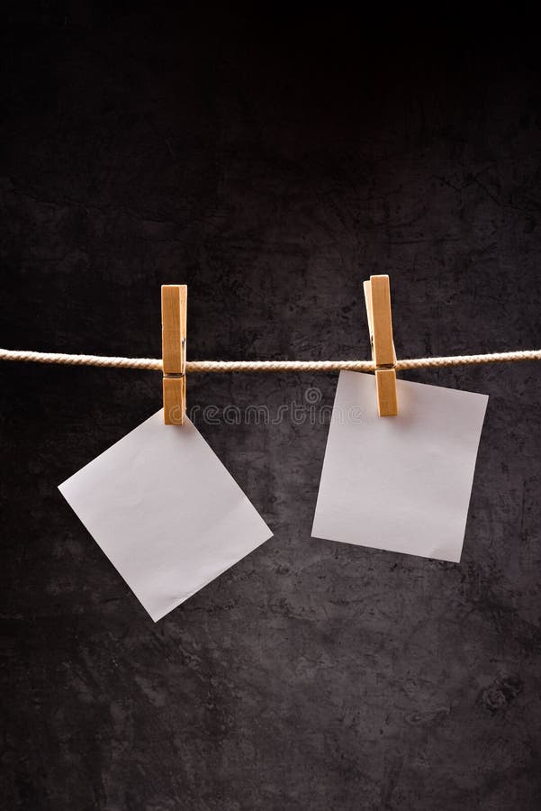 Two Blank Paper Notes Hanging on Rope with Clothes Pins Stock Photo ...