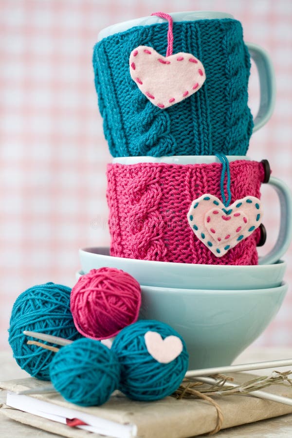 Two Blue Cups in Blue and Pink Sweater with Felt Hearts Stock Photo ...