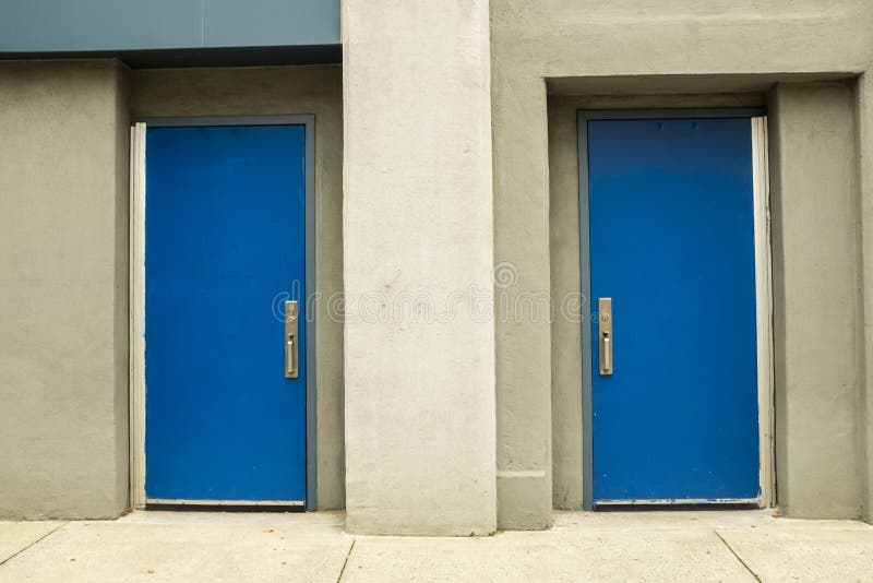 Two blue doors stock image. Image of entrance, exterior - 197636767