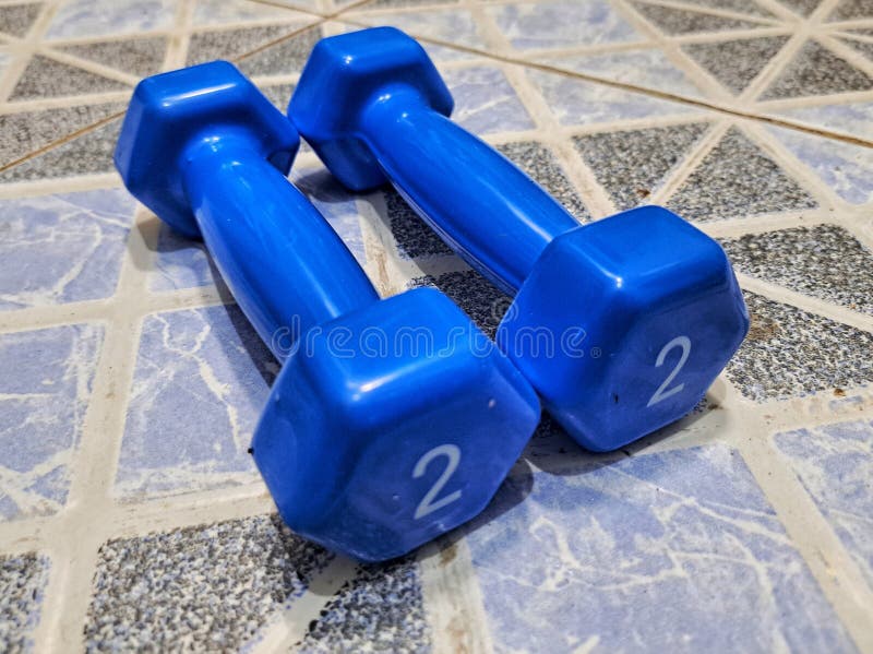 Two Blue Dumbbells Next Each Other Stock Photos - Free & Royalty-Free ...