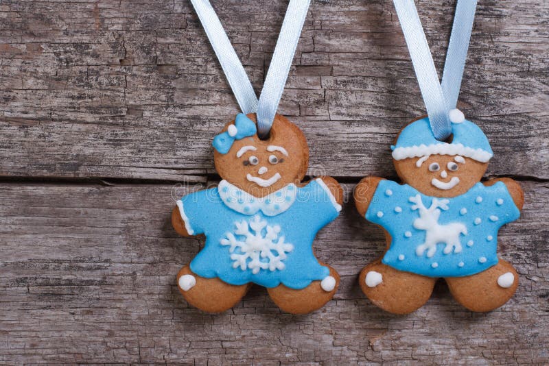Gingerbread Man in a Blue Coat and Hat with a Deer Stock Image - Image ...