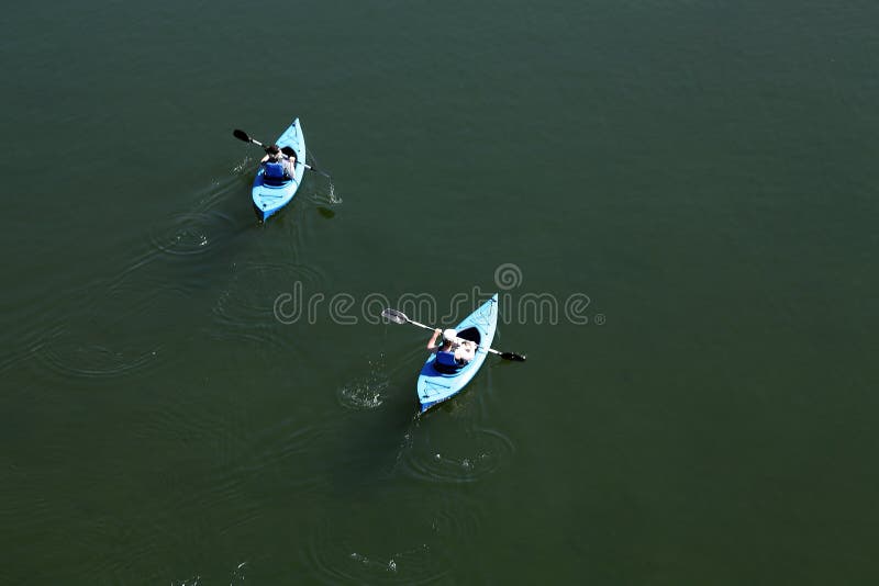 Two Blue Kayaks on River from Above Stock Image - Image of people ...