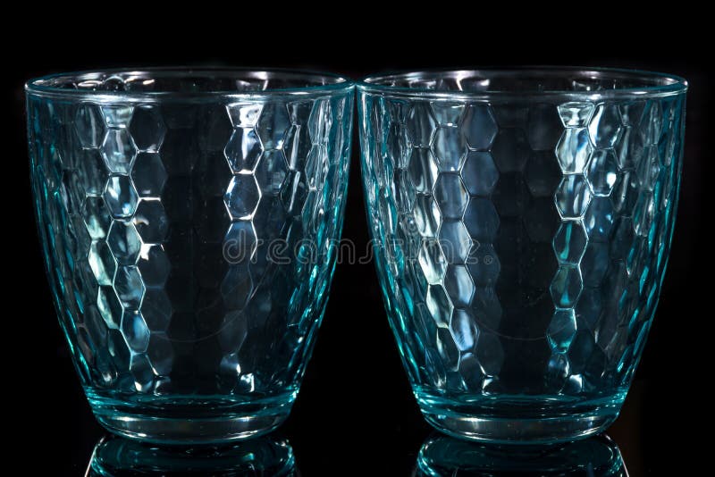 Two Blue Multi Faceted Glasses On A Different Background Stock Image Image Of Shot