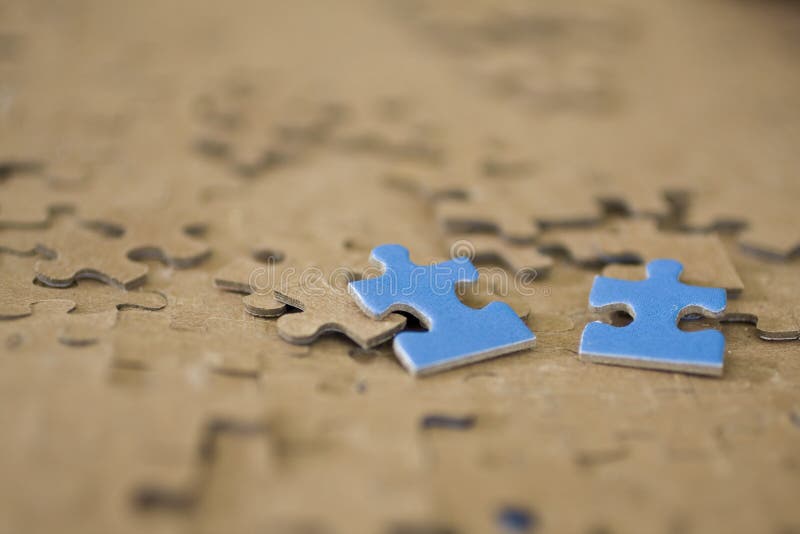 Two Blue Puzzle Pieces stock photo. Image of disability - 67958416