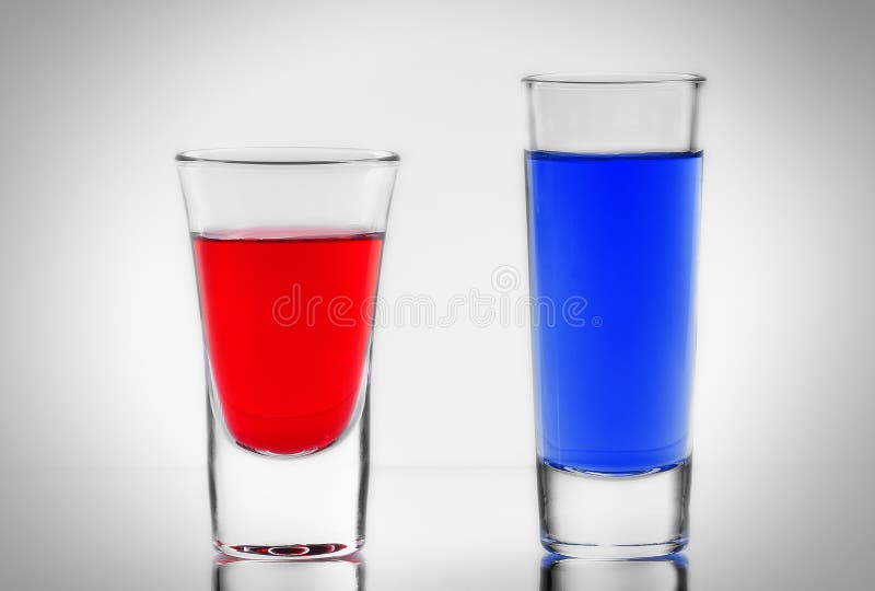 Two Blue and Red Cocktail in Full Transparent Shot Glasses with Stock ...