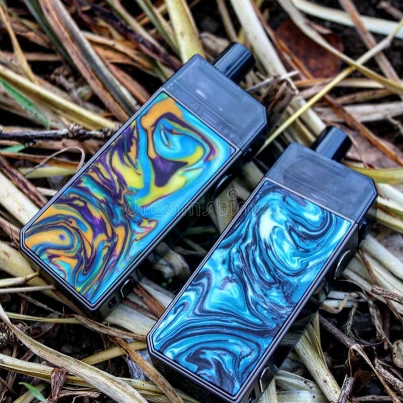 Two Blue Vape Electrnic on the Leaves Stock Photo - Image of electrnic ...