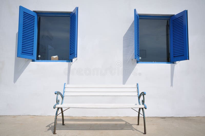 Two blue window stock image. Image of chair, wall, texture - 14382445