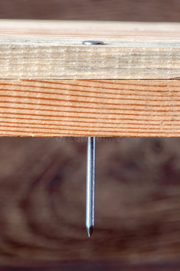 Two Boards Knocked Down with a Big Nail. Connection with the Help of ...