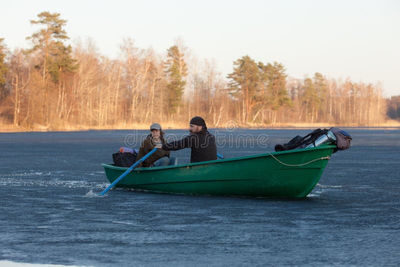 Two in a boat stock image. Image of sunlight, travel - 90538889