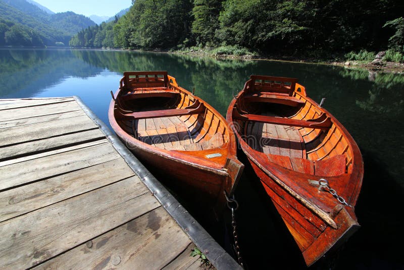 Boats on the lake stock photo. Image of boats, reflected - 21521712