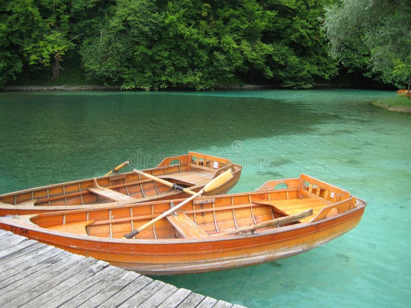 Two boats stock image. Image of water, green, forest - 35298821
