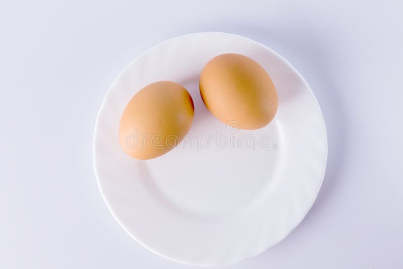 Raw Two-yolk Egg On The Plate Stock Photo - Image of lunch, cuisine ...