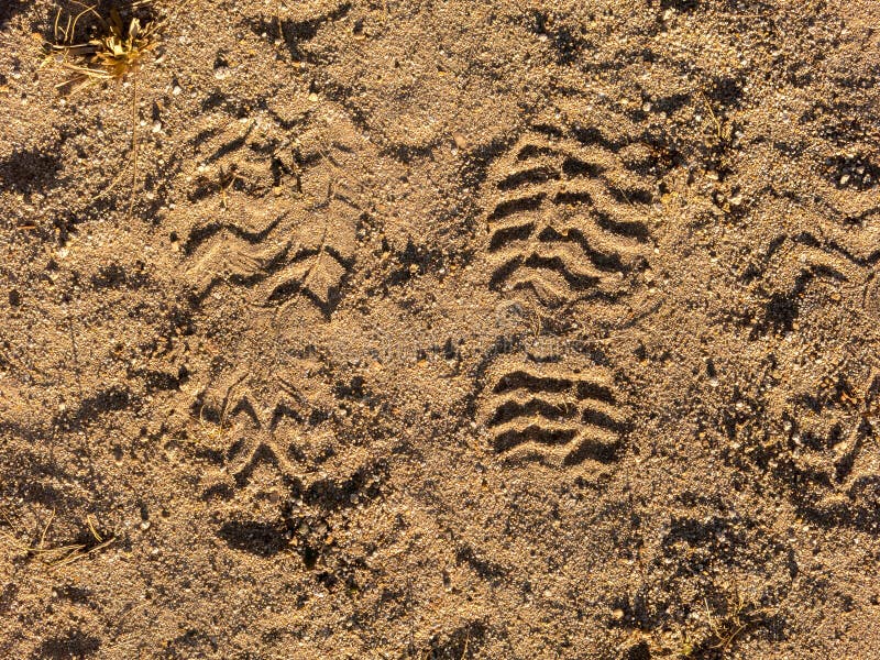 Two Boots Footsteps on Sand Stock Image - Image of footstep, journey ...