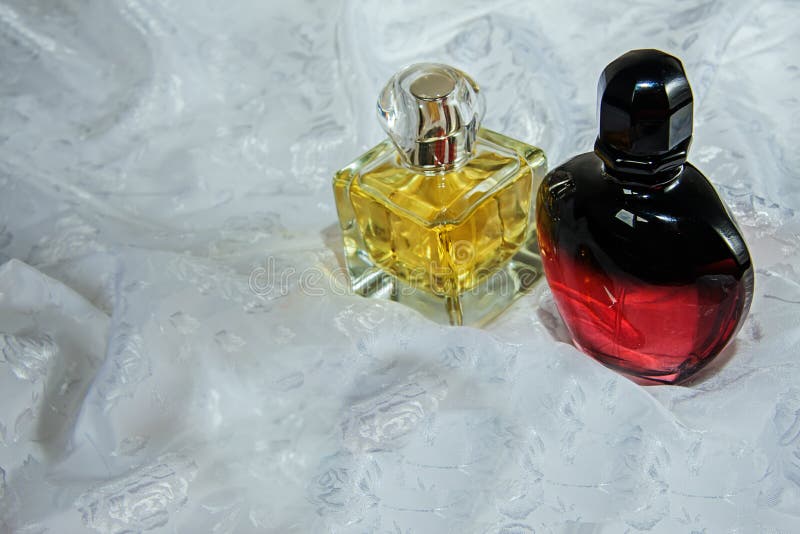 Two bottle of perfume stock image. Image of luxury, glass - 76121823
