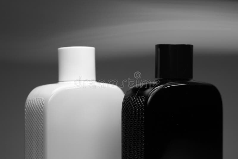 Two Bottles of Man Perfume on Grey Background Stock Photo - Image of ...
