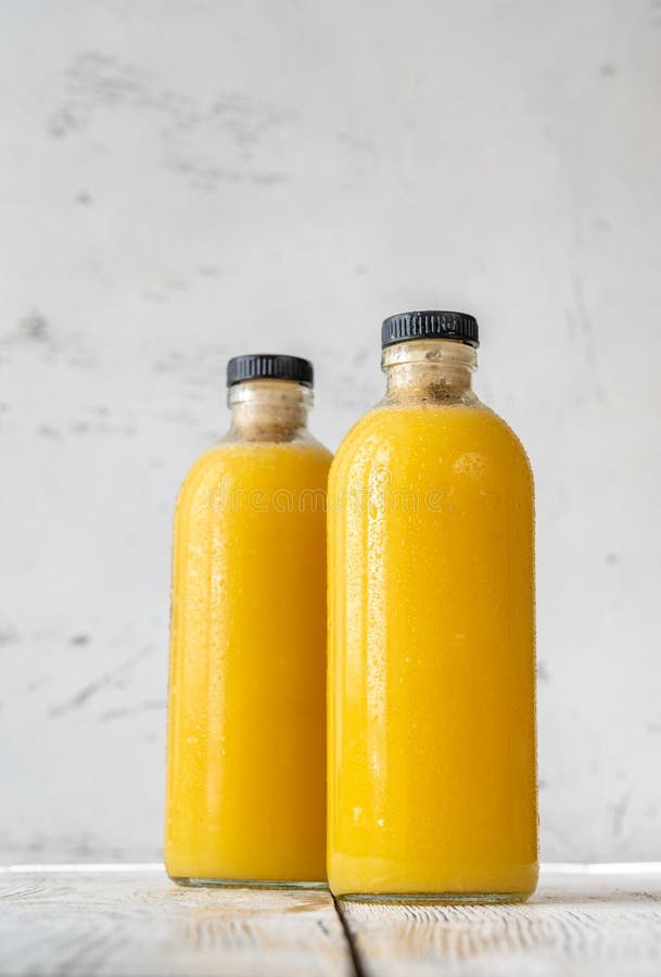 Two Bottles of Orange Juice Stock Image - Image of citrus, exotic ...