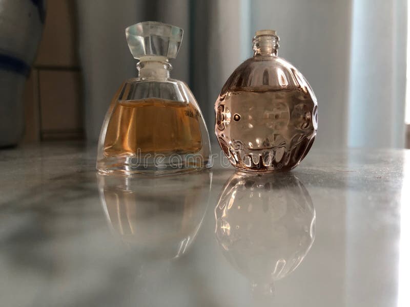 Two bottles of perfume stock photo. Image of hygiene - 145581798