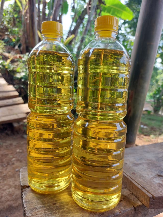 Two Bottles of Yellow Cooking Oil Stock Image - Image of cooking ...