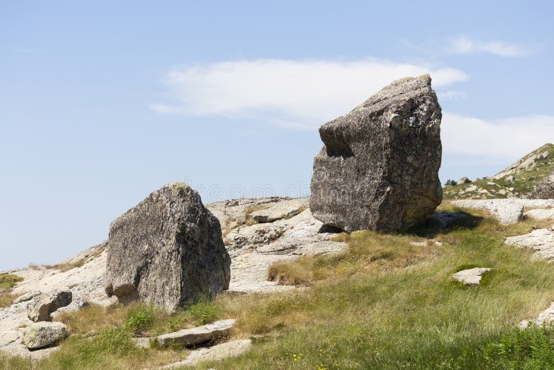 Two Boulders stock image. Image of summer, grass, stone - 62155859