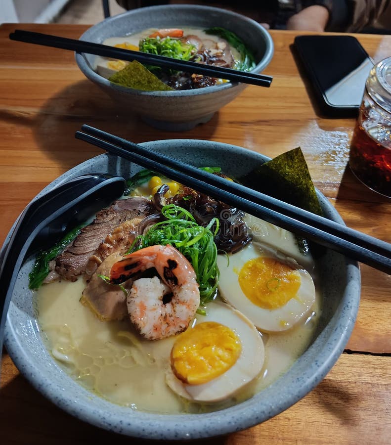 Two Bowls of Nutrient-Rich Ramen with Creamy Broth Stock Photo - Image ...