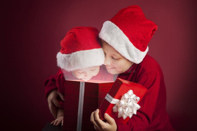Two Boy Open Christmas Gift-box Stock Photo - Image of paper, happiness ...