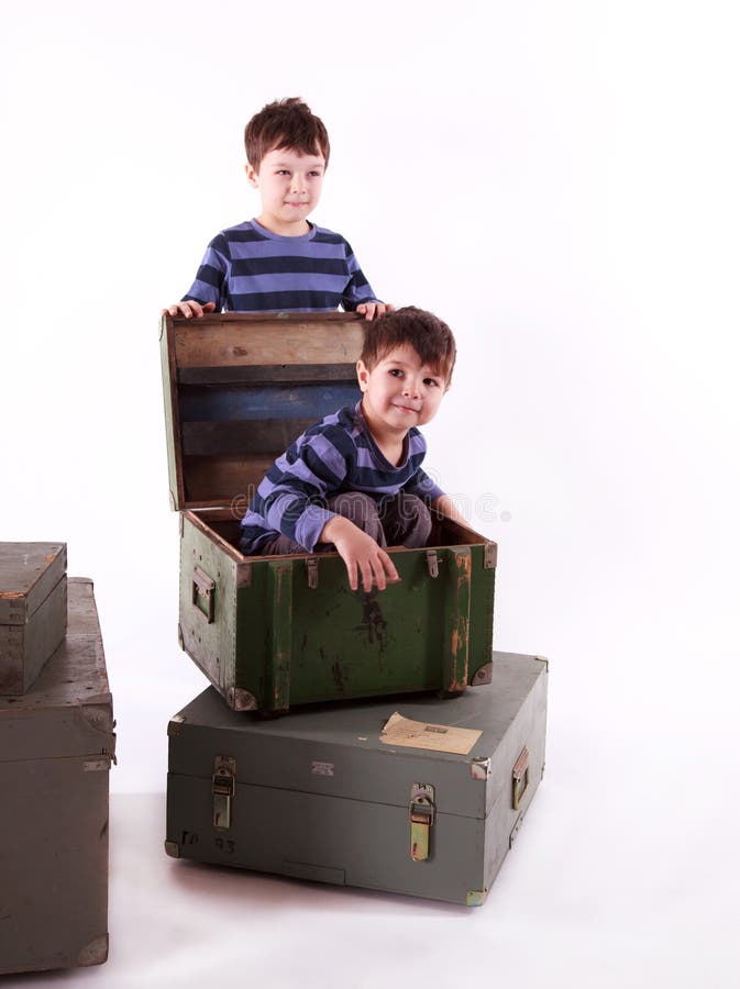 Two Boys, Brothers, Playing with Boxes on White Background Stock Image ...