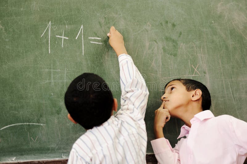 Two Boys in Classroom Thinking Stock Image - Image of chalkboard ...