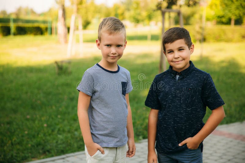 Two Boys Friends Spend Time in Park. Children Models Stock Image ...