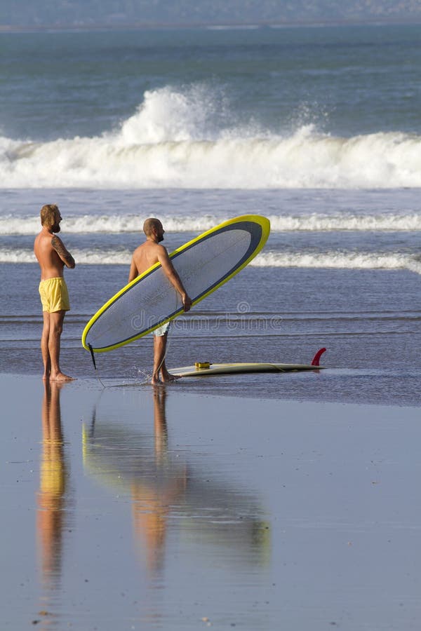 Two boys go surfing stock image. Image of holiday, lifestyle - 32742051