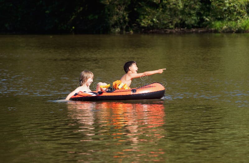 Two Boys Having Fun with Inflatable Rubber Boat Stock Image - Image of ...