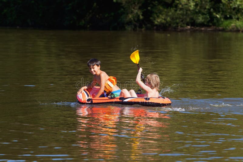 Two Boys Having Fun on Inflatable Rubber Boat Stock Image - Image of ...