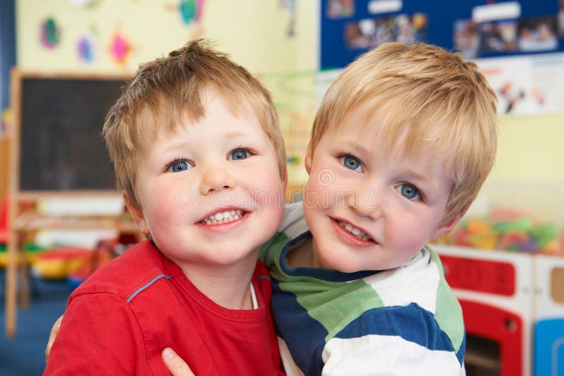 Two Boys Hugging One Another at Pre School Stock Photo - Image of ...