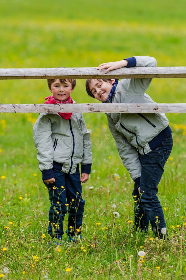 Child Leaning Over Fence Stock Photos - Free & Royalty-Free Stock ...