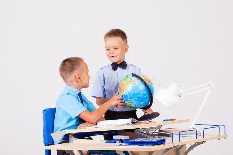 Two Boys are Learning Globe for Desk at School Stock Photo - Image of ...