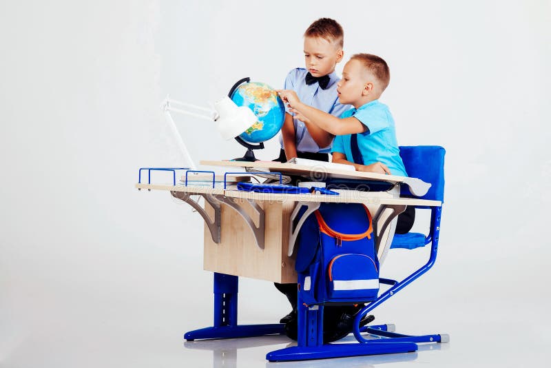 The Two Boys are Learning Globe for Desk at School Stock Image - Image ...
