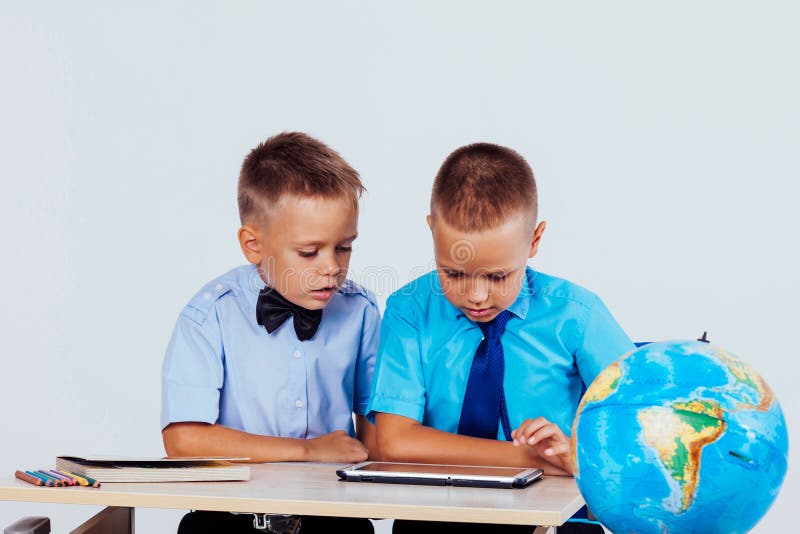 The Two Boys are Looking at Internet Tablet School Stock Image - Image ...