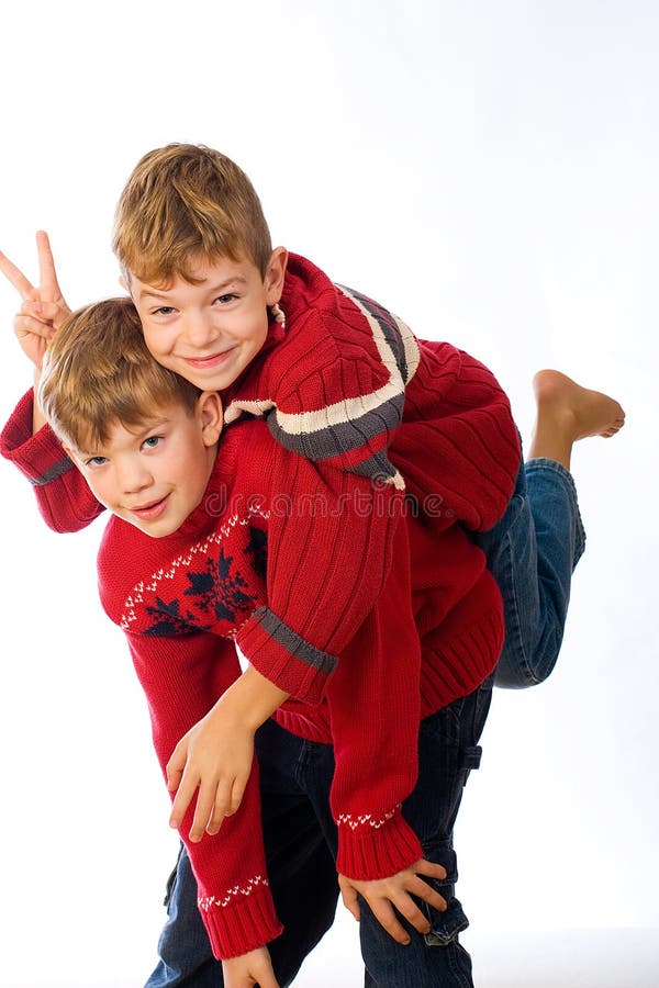 Two boys playing stock photo. Image of sweater, boys - 21979774