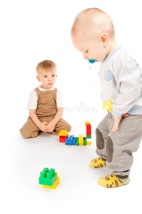 Two Boys Playing with Blocks Stock Photo - Image of childhood, child ...