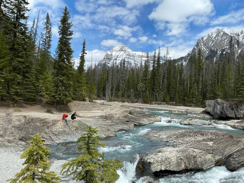 Two Boys Playing on the Rocks Near the River Stock Image - Image of ...