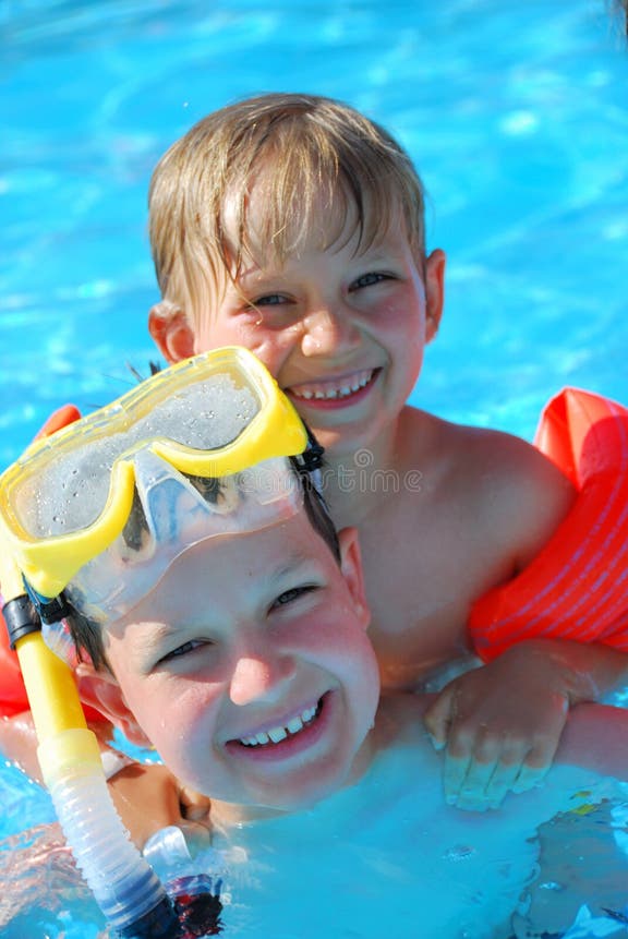 Two boys in pool stock photo. Image of together, males - 2616700