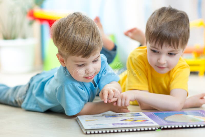 Two Boys Reading a Book Together Stock Image - Image of cute, enjoy ...