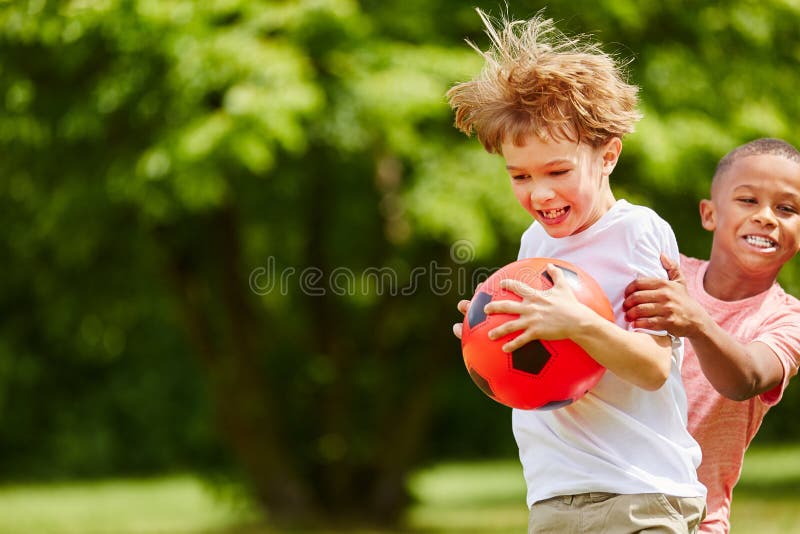 Two Boys Scuffle during Soccer Match Stock Image - Image of kids ...