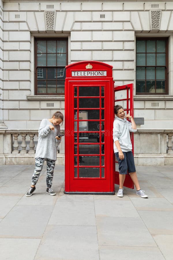 Two Boys and a Telephone Box in London Stock Image - Image of child ...