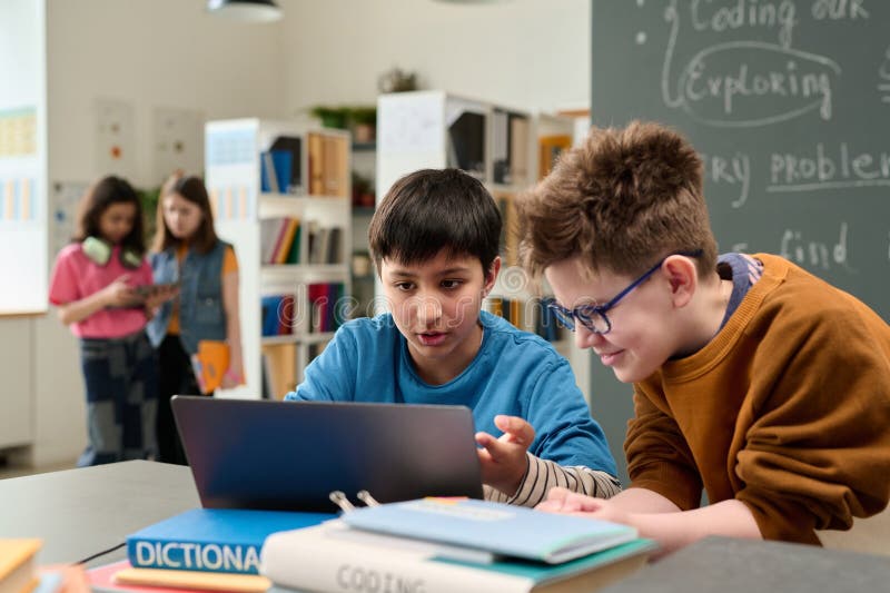 Two Boys Using Computer in School Library Stock Image - Image of ...