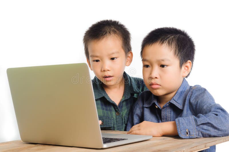 Two boys using notebook stock image. Image of share, happy - 61588843