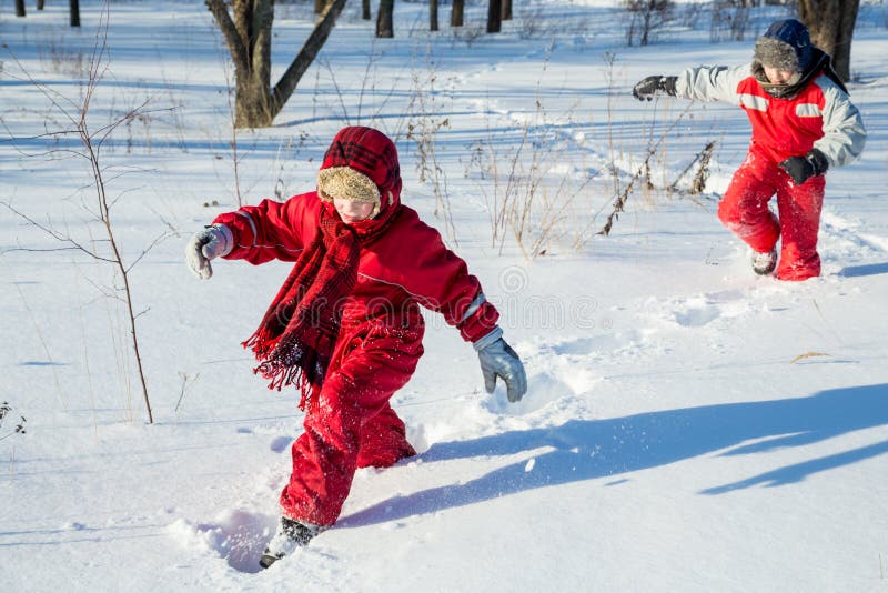 Two Boys Walking at the Snow on Park Stock Photo - Image of snow ...