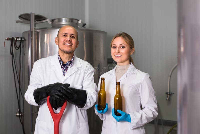 Two Brewery Workers on Beer Factory Stock Image - Image of beer ...